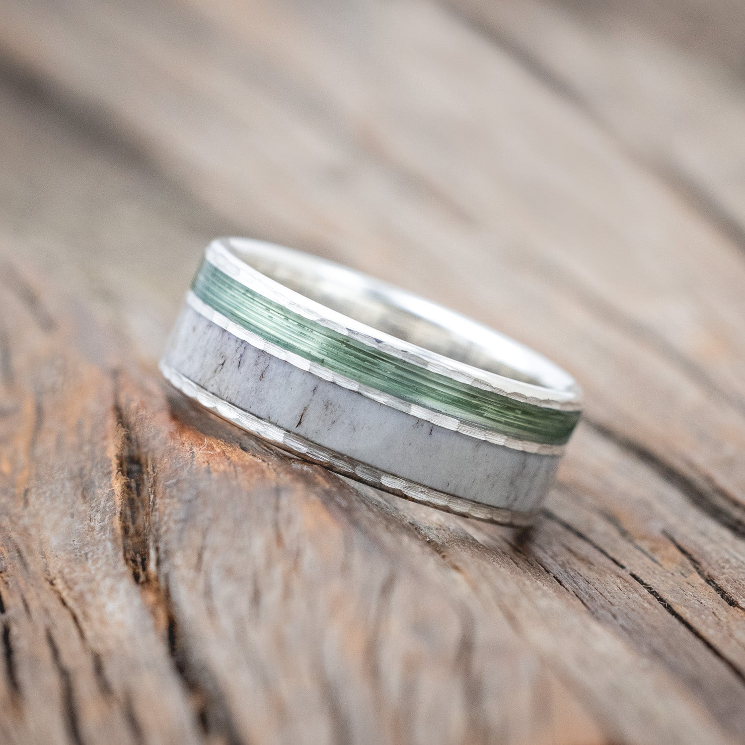 "RAPTOR" - ANTLER & FISHING LINE WEDDING RING FEATURING A HAMMERED BAN