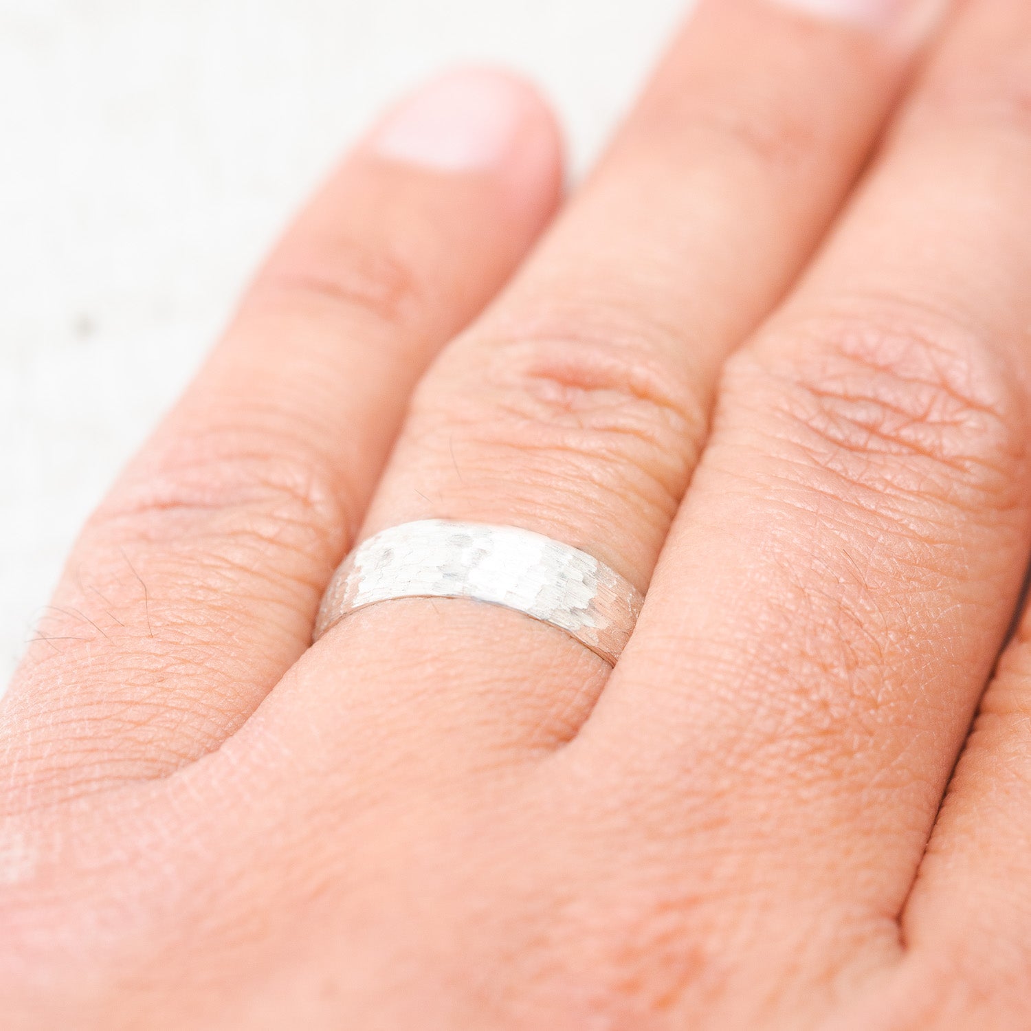 DOMED PROFILE WEDDING BAND WITH HAMMERED FINISH